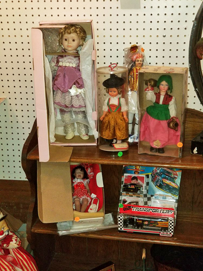 International doll summit in progress! These boxed beauties represent different cultures while preserving childhood memories from decades past.