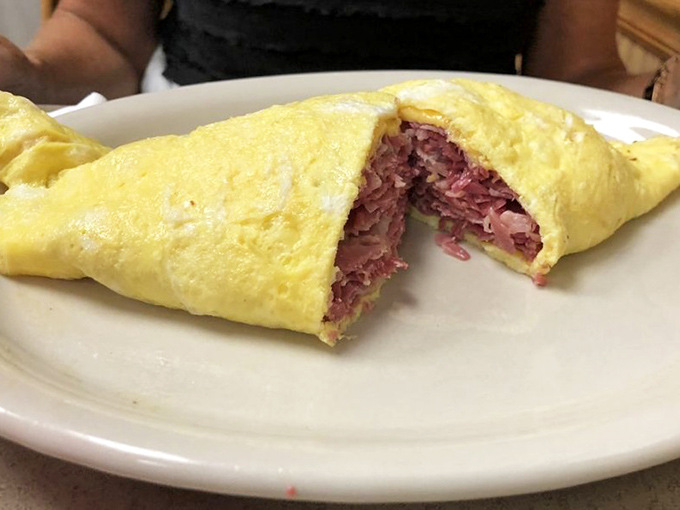 The corned beef omelet: breakfast and lunch having a delicious identity crisis that nobody wants to resolve.