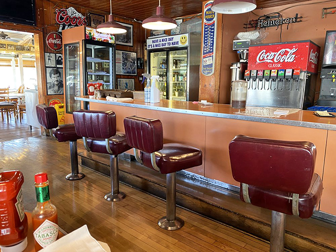 The counter seats offer front-row tickets to the culinary show. Grab a stool and watch breakfast magic happen in real time.