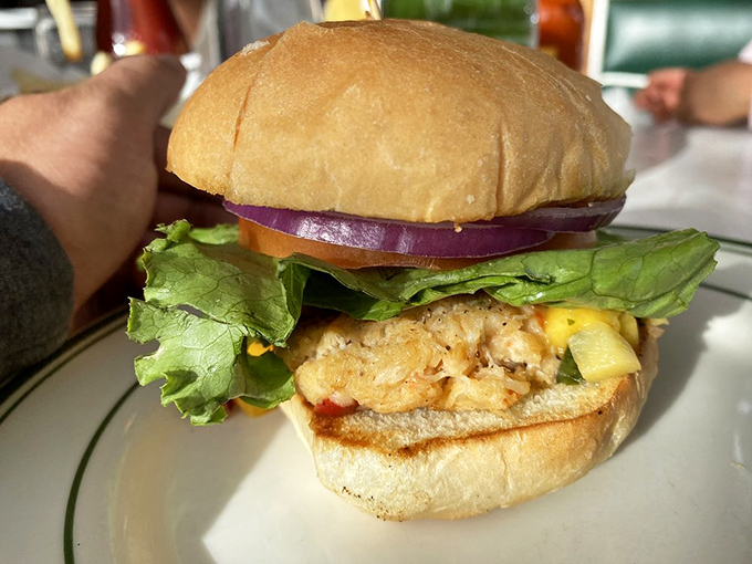 This burger isn't just photogenic&mdash;it's ready for its close-up. The fresh lettuce and red onion add both color and crunch to this handheld masterpiece.