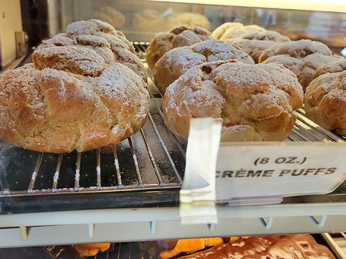 These cream puffs aren't just desserts &ndash; they're cloud-like vessels of happiness dusted with powdered sugar and possibility.
