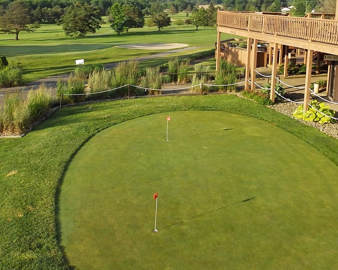 This putting green offers a gentler landscape than the rugged oil fields that made the region famous&mdash;from crude oil to manicured greens.