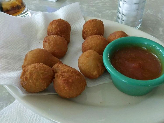 Deep-fried mushrooms&mdash;nature's little umami bombs in a crispy jacket. The perfect excuse to eat vegetables while technically having dessert. 