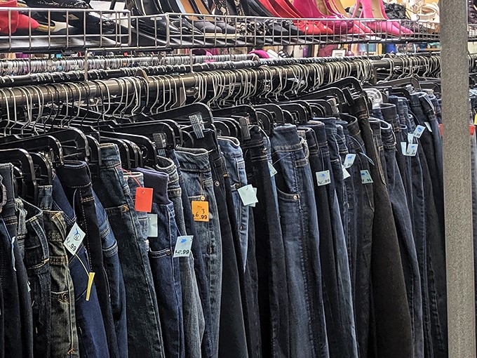 Denim dreams hanging in perfect formation. Finding that magical pair of pre-broken-in jeans is like striking secondhand gold.