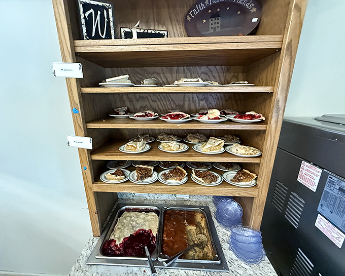 Dessert heaven's display case, where pie decisions become life decisions. "I'll just look" becomes "I'll take one of each" faster than you can say "&agrave; la mode."