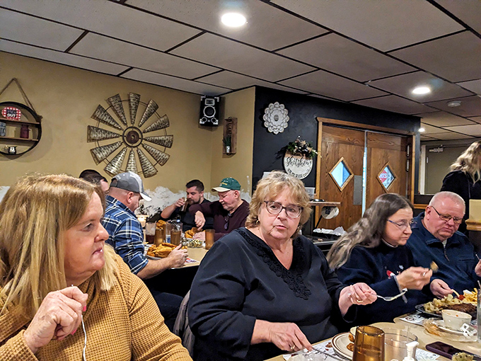 Diners enjoying the communal experience that defines supper clubs. Where strangers become friends over shared appreciation of honest food.