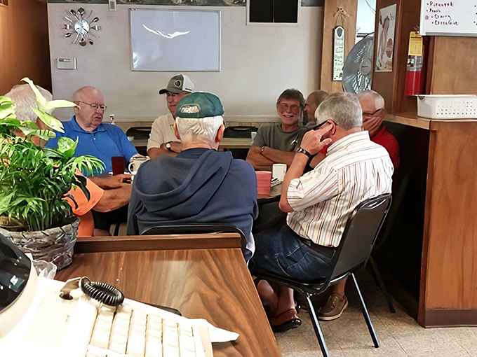 The morning roundtable where local wisdom is exchanged, world problems are solved, and coffee flows as freely as the conversation.