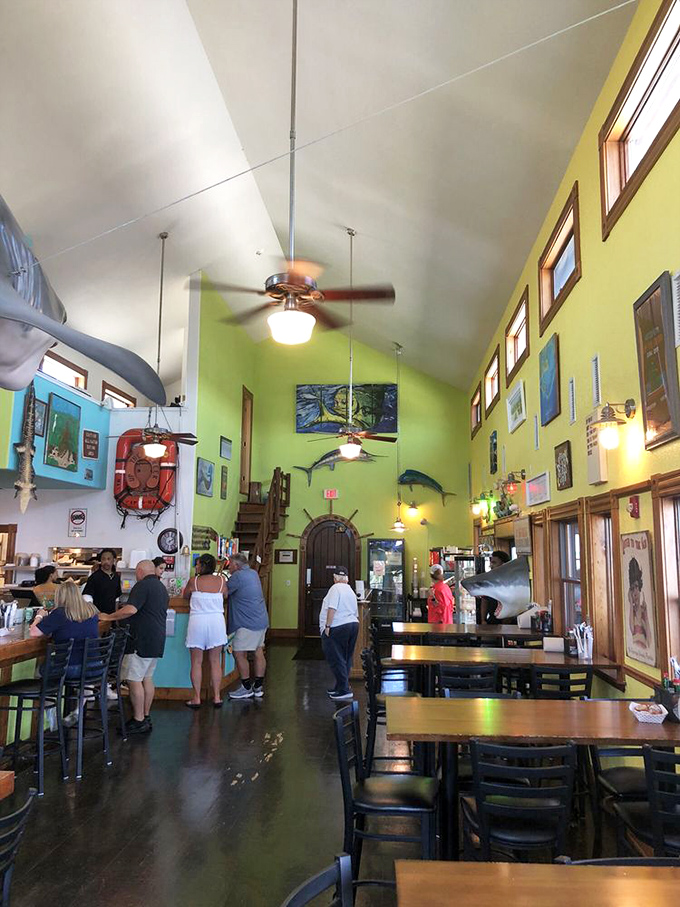 Locals and visitors mingle at the bar, united by their quest for the freshest catch and coldest beverages in Apalachicola.
