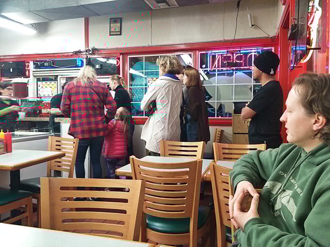 The anticipation in the air is thicker than the milkshakes as hungry patrons queue up for their turn at taste bud nirvana.