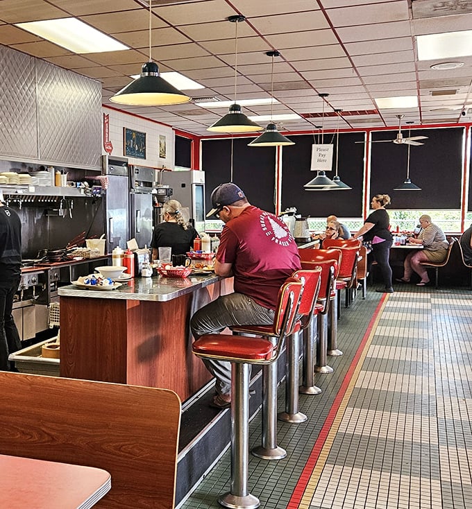 Morning rhythms at the counter&mdash;where solo diners find company and the staff moves with the choreographed precision of a breakfast ballet.