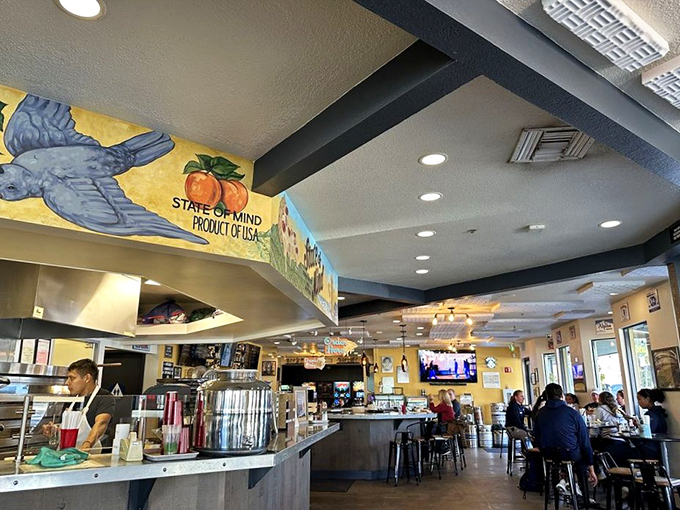 Where strangers become friends over shared pizza enthusiasm. The dining room buzzes with the sound of happiness and cheese pulls.