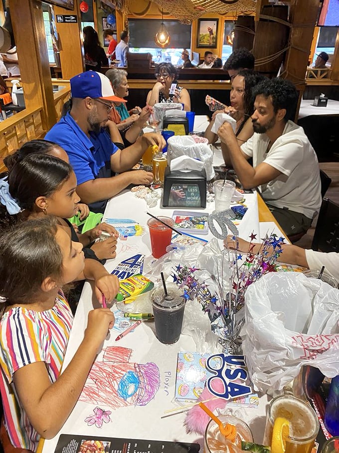 Family-style dining where crayons and seafood create memories&mdash;because the best conversations happen over paper-covered tables.