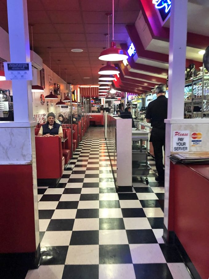The long view down the diner reveals the sacred geometry of American comfort food&mdash;a perfect line of booths leading to culinary salvation.