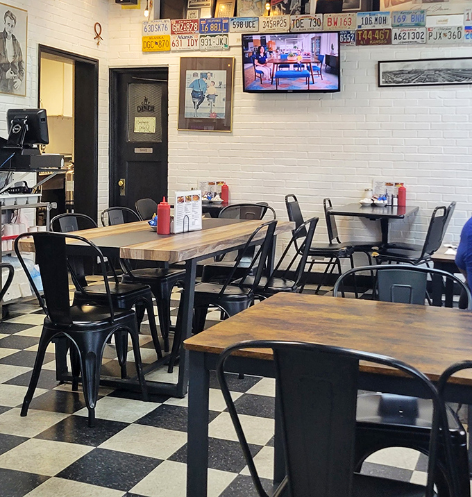 Modern meets classic with wooden tables and metal chairs. The TV in the corner ensures you won't miss the game while tackling your pancakes.