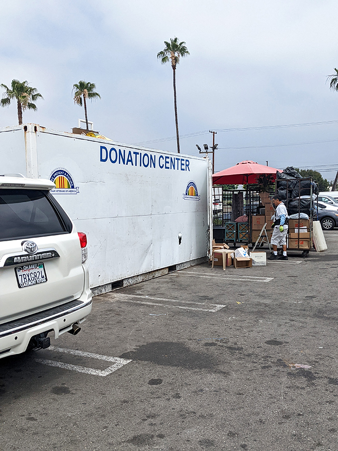 The circle of thrift begins at the donation center. Under palm trees and blue skies, yesterday's extras become tomorrow's essentials for someone new.