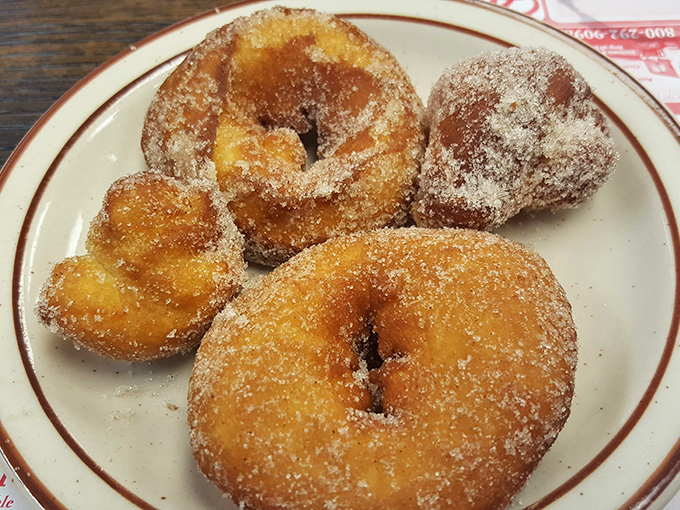 Donuts made while you wait&mdash;the original "worth the wait" food. That sugar coating isn't just sweetness, it's edible nostalgia dusted with childhood memories.