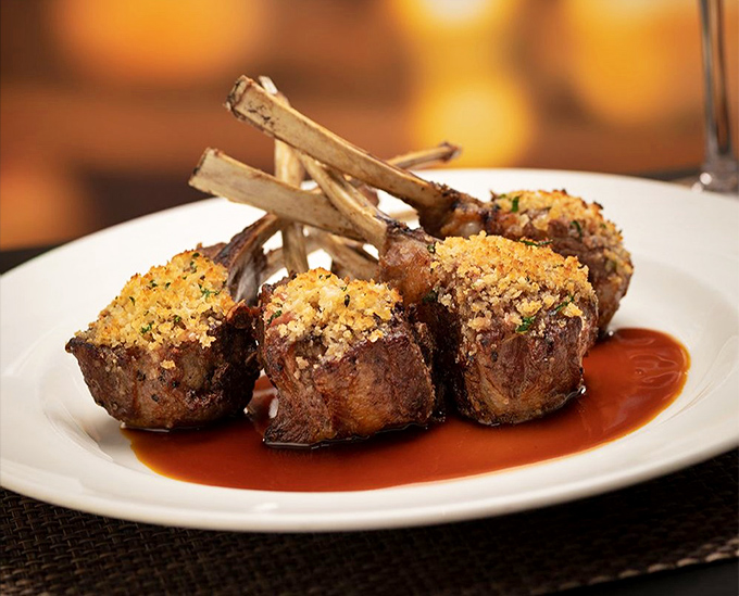 Lamb chops wearing their breadcrumb best. These aren't just chops&mdash;they're tiny meat lollipops for sophisticated grown-ups.