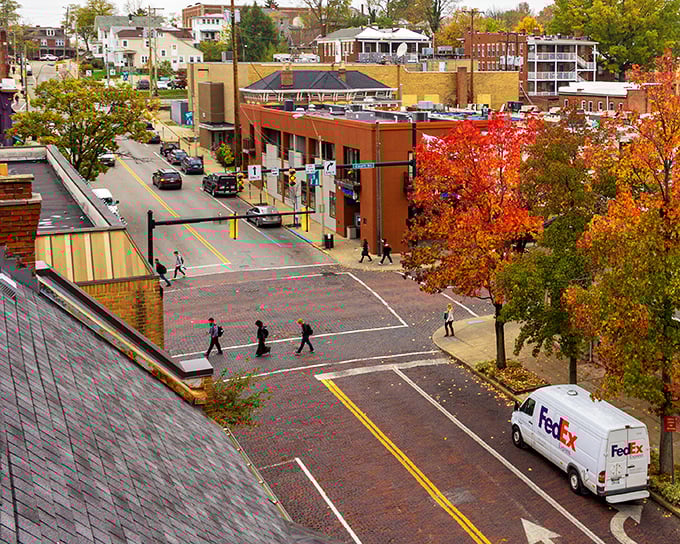 Fall transforms Athens into a painter's palette of reds and golds, the perfect backdrop for students and locals crossing brick-lined intersections.