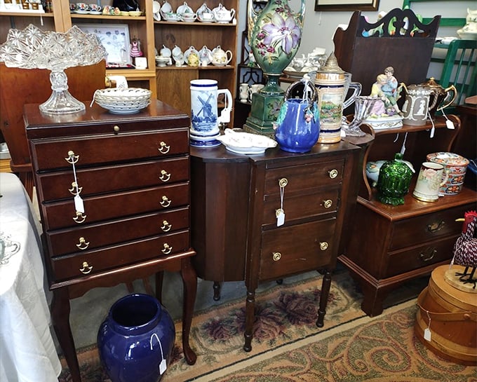 Stately wooden dressers stand at attention, topped with crystal, porcelain, and pottery. These aren't just furniture pieces—they're family heirlooms in waiting.