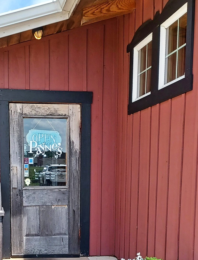 The weathered wooden door with its cheerful "OPEN" sign feels like an invitation to step from Indiana into a little corner of Britain.