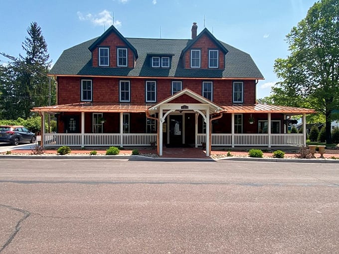 The Eagles Mere Inn welcomes visitors with its wraparound porch and classic red clapboard exterior &ndash; a Norman Rockwell painting brought to three-dimensional life.