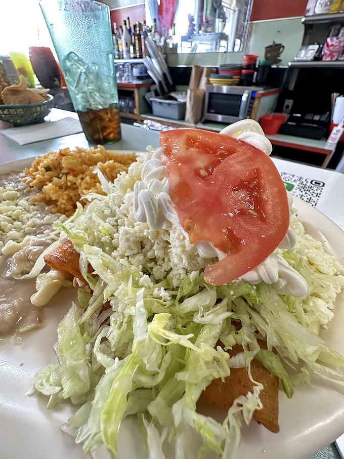 This isn't just a plate of food&mdash;it's a mountain of freshness. The lettuce avalanche and tomato summit make for a glorious climb.