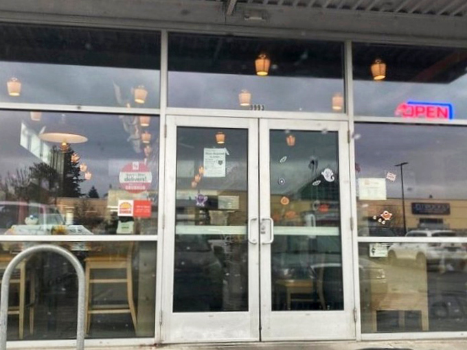 The entrance to happiness is often unassuming&mdash;just a glass door with an "OPEN" sign promising all will be well inside.