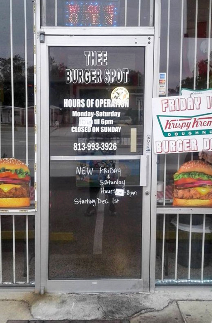 The front door that might as well be a portal to flavor country, complete with hours that tell you exactly when you can make your escape from mediocre meals.