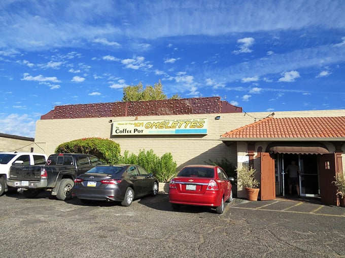 The exterior promises what awaits inside: Southwestern charm, hearty portions, and the eternal question of which omelet to choose.