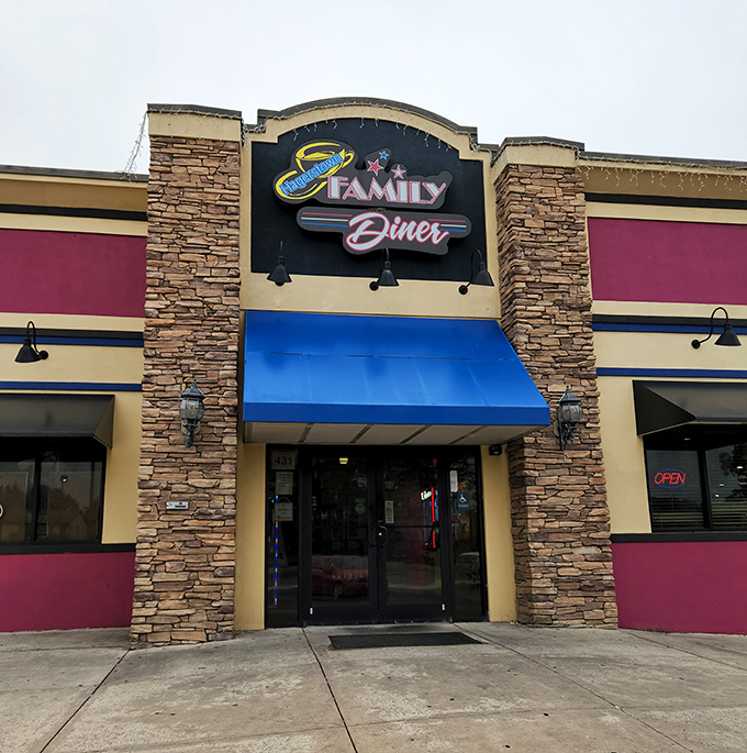 The entrance beckons with its distinctive blue awning and stone columns&mdash;a landmark that says "comfort food ahead" to hungry travelers.