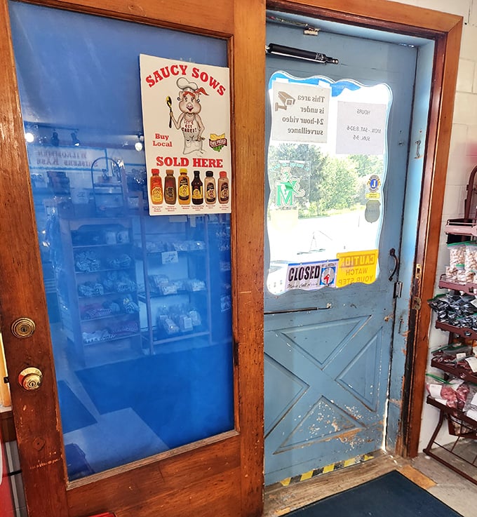 That blue door might as well be a portal to flavor country. The Saucy Sows sign promises local hot sauce adventures await.