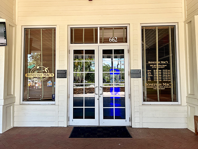The entrance to your new favorite Florida seafood spot. Simple, welcoming, and promising delicious adventures beyond those double doors.