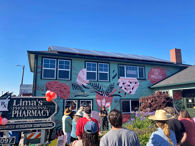 Eureka's buildings serve as canvases for vibrant public art. Even the local pharmacy gets dressed up for the town's creative celebrations.