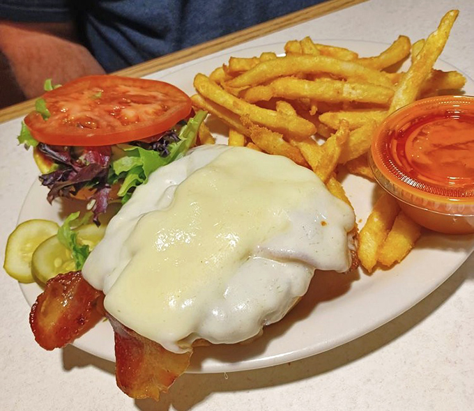 A sandwich that requires both hands and a stack of napkins &ndash; the universal sign of something worth every delicious, messy bite.