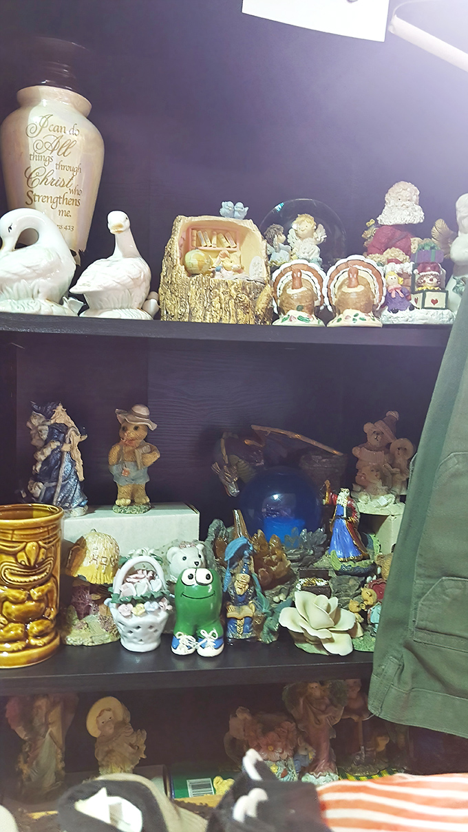 Figurine fantasia! From religious icons to cartoon characters, this shelf proves that one person's tchotchke is another's cherished treasure.