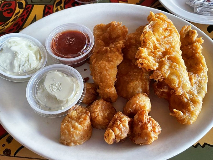 This seafood platter doesn't just feed you—it tells a story of lakes and oceans, all delivered in golden-fried perfection.