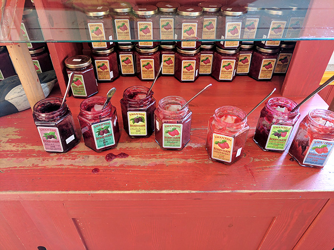 An altar to preserved fruit&mdash;jars of jewel-toned jams with sampling spoons standing by. Resistance is futile.