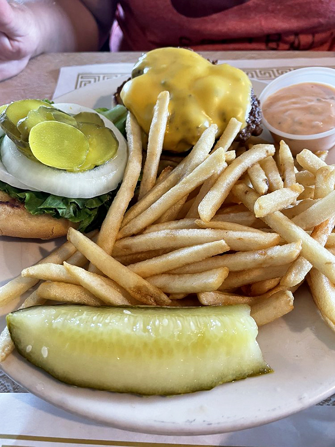 A burger that doesn't need a fancy name or artisanal designation&mdash;just honest beef, melty cheese, and fries that actually taste like potatoes.