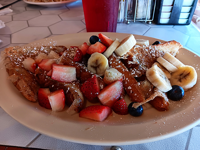 French toast that's dressed for success with a fruit confetti celebration. Whoever said breakfast can't be both virtuous and decadent clearly never met this plate.