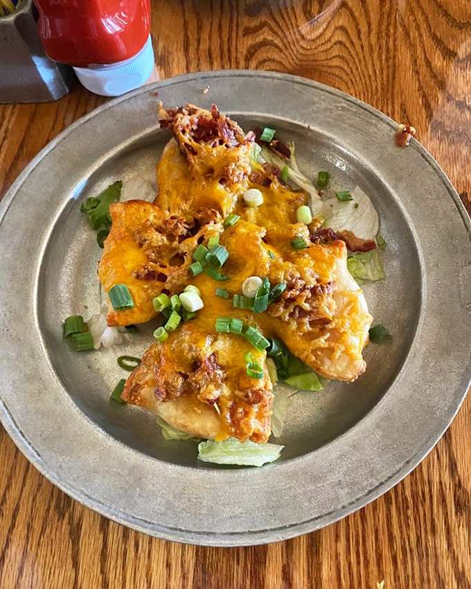 Golden pierogies wear their melted cheese and scallions like jewelry. Eastern European comfort food that's found its perfect Pennsylvania home.