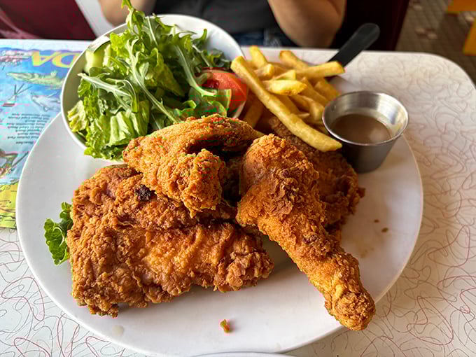 Fried chicken so perfectly golden it deserves its own Instagram filter &ndash; crispy on the outside, juicy on the inside.