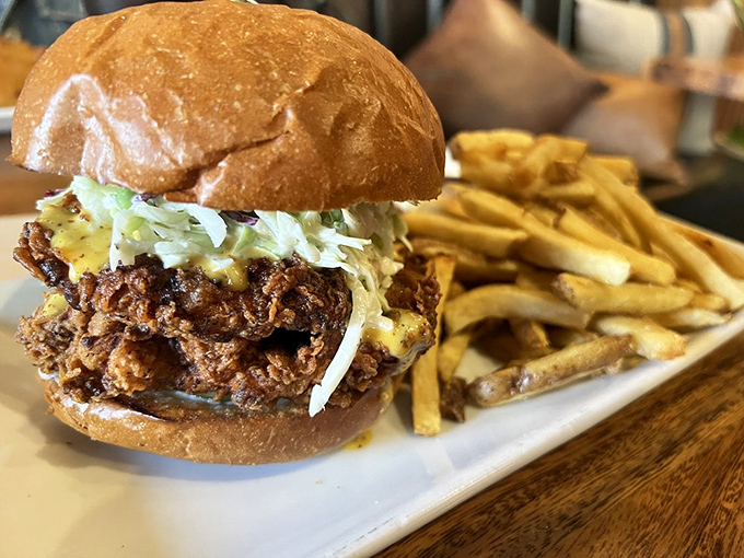 This fried chicken sandwich isn't just good—it's "take a picture before you devour it" good. Crispy, juicy, and served with fries that didn't come from a freezer.