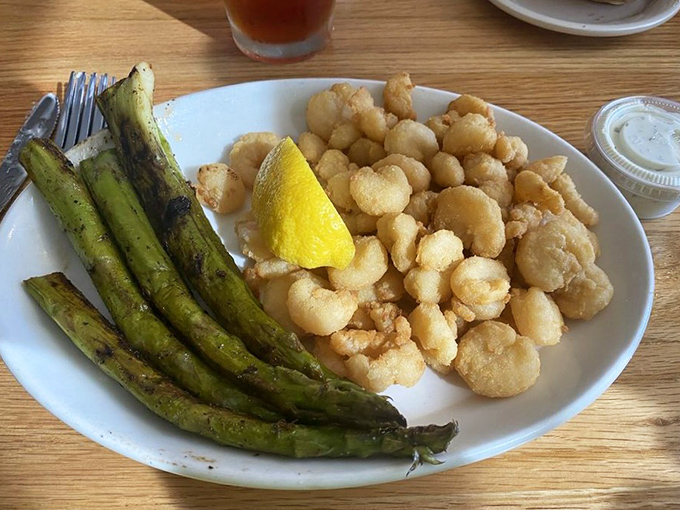 Simple pleasures: perfectly fried creek shrimp alongside grilled asparagus. Sometimes the least complicated dishes create the most vivid memories.