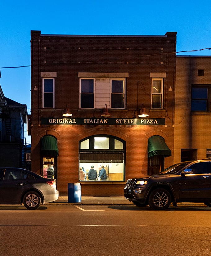 Evening glow reveals the truth – this unassuming building houses Pennsylvania's most talked-about pizza treasure.