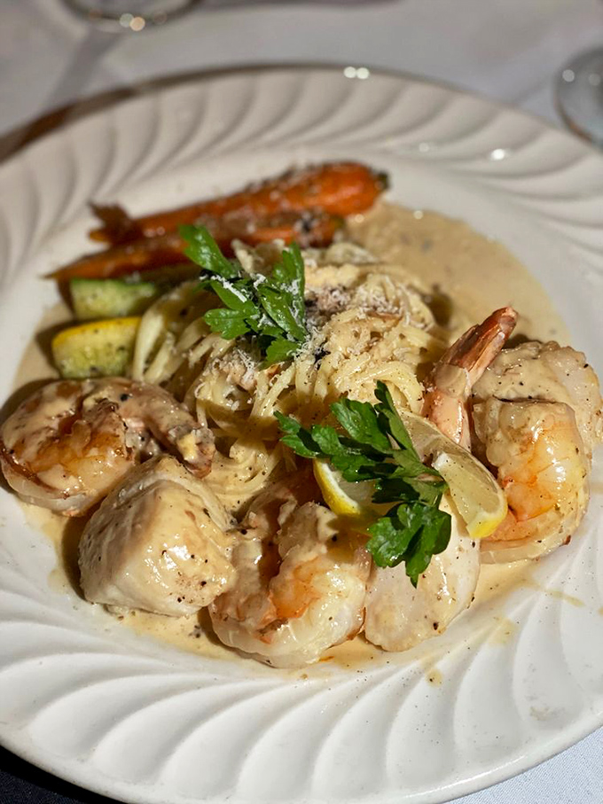 Shrimp and scallops swimming in a sea of creamy sauce with pasta&mdash;a dish that makes you wonder why you ever eat anything else.