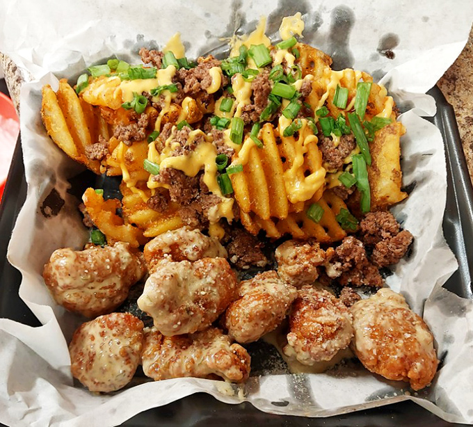 Loaded fries that require a game plan before eating and wings that make you wonder why you ever bothered with fancy restaurants.