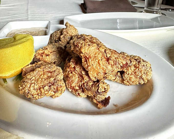 Golden-fried gator bites that turn the intimidating into the irresistible &ndash; proving that sometimes the most interesting meals begin with courage.