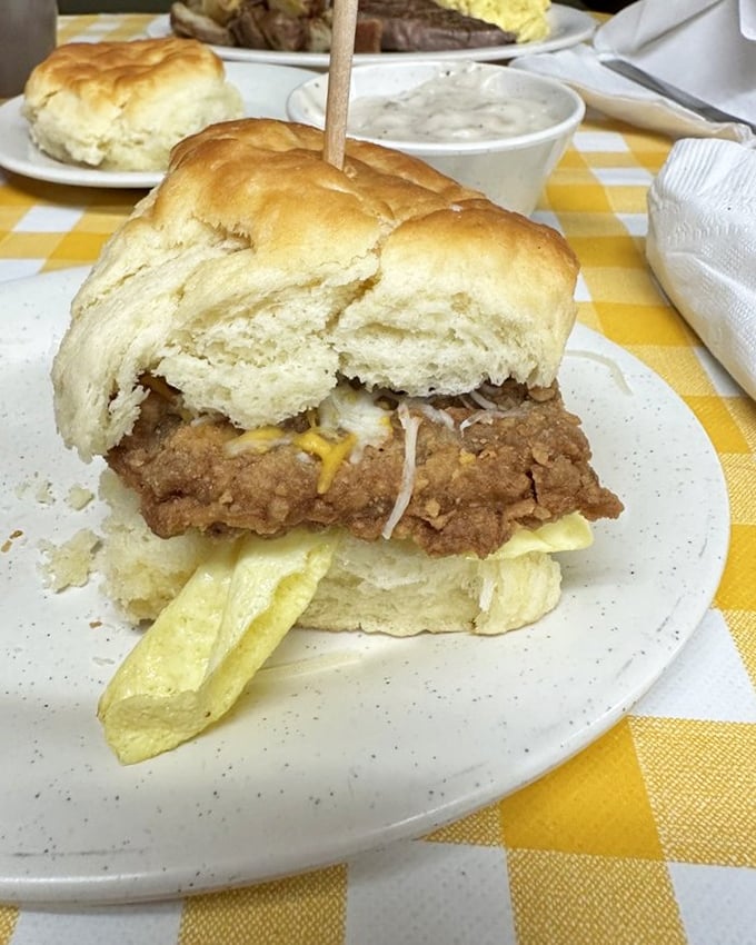 The Clucker sandwich: fried chicken nestled in a cloud-like biscuit. Whoever said breakfast sandwiches can't change lives hasn't been here.
