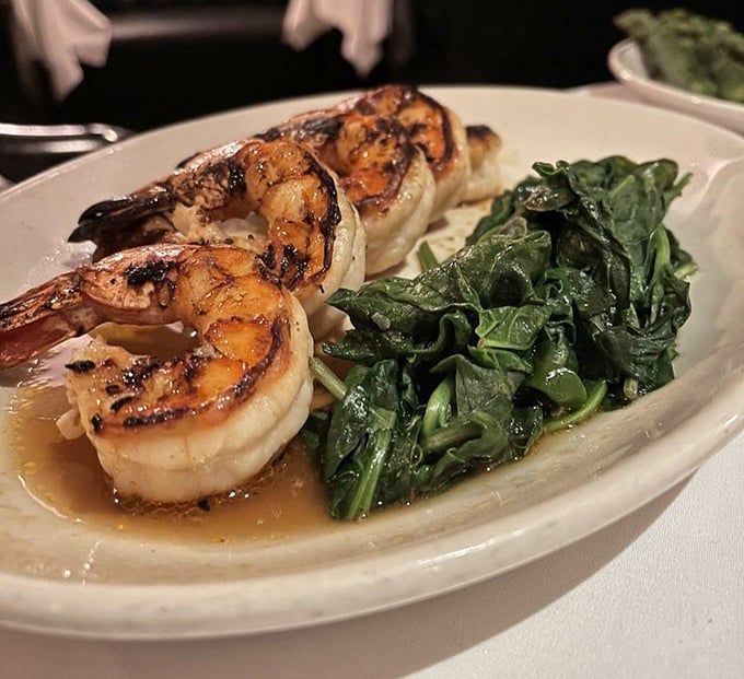 Shrimp so perfectly grilled they look like they jumped straight from ocean to flame to plate. That spinach isn't just a side&mdash;it's a worthy companion. 