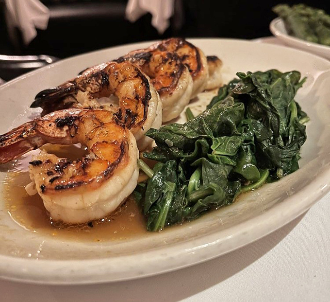 These grilled shrimp practically dance alongside their emerald spinach partners&mdash;proof that simple ingredients become extraordinary in the right hands.